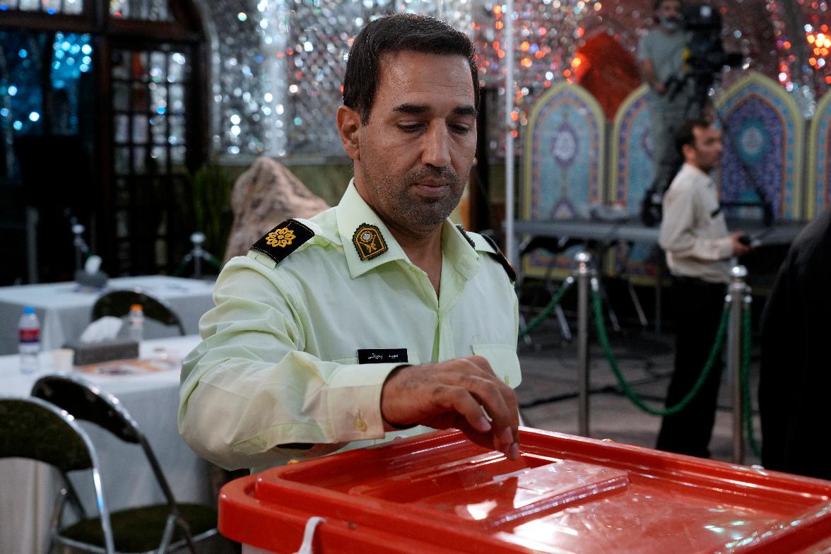 Iran holds runoff presidential vote pitting hard-liner against ...