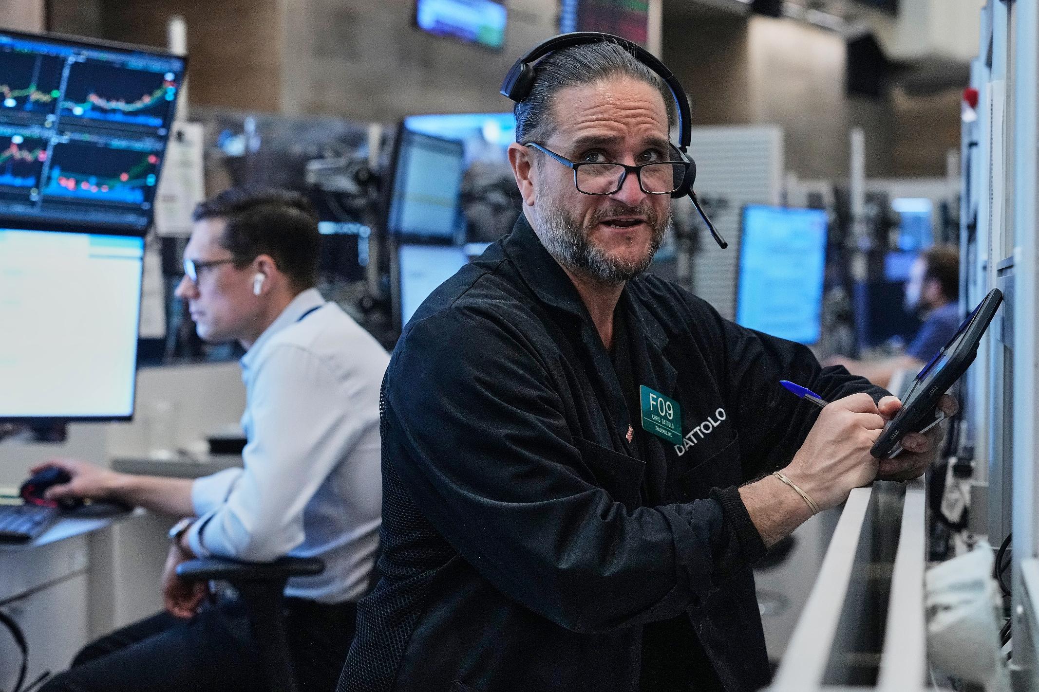 Wall Street opens higher as AI stocks regain some more ground and oil ...