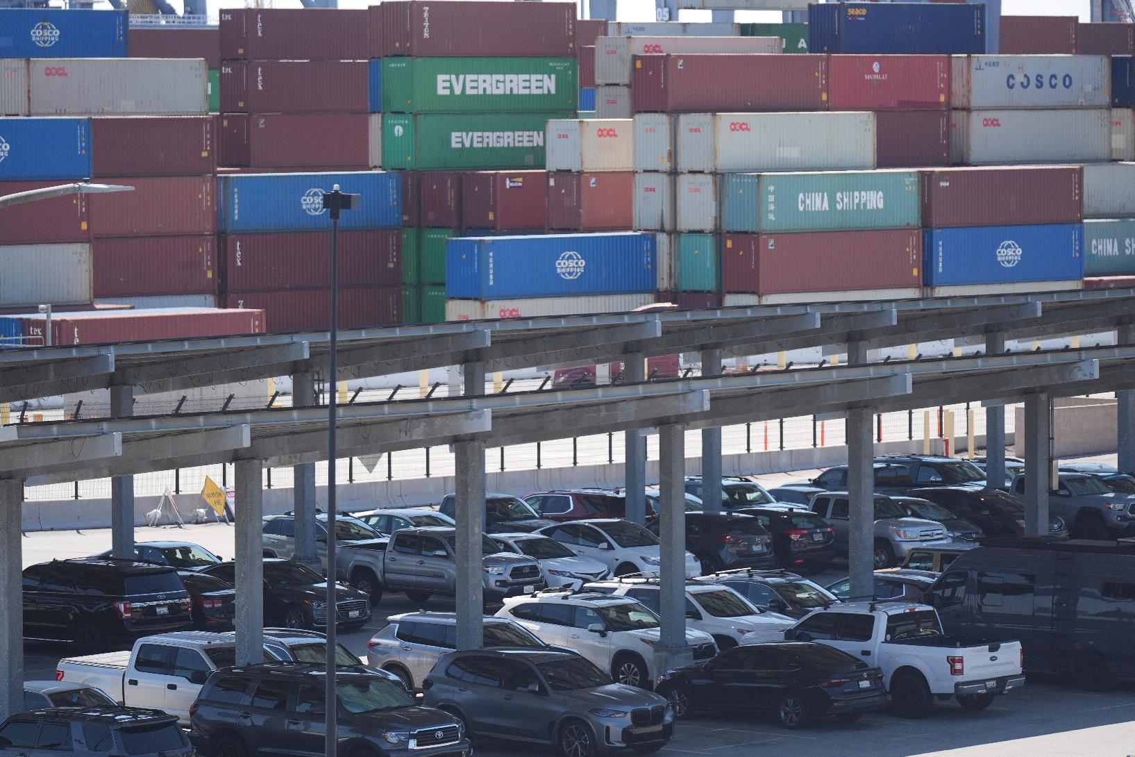 The Latest: Asia shares sink as US tariffs take effect